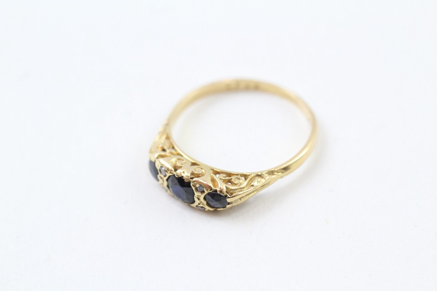 Lot 282 - AN 18CT GOLD, DIAMOND AND SAPPHIRE SEVEN