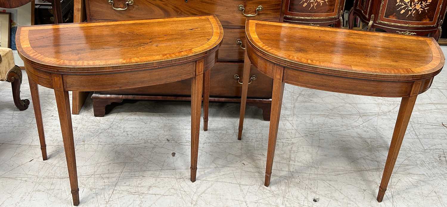 Lot 711 - A PAIR OF GEORGE III DEMI LUNE CARD TABLES