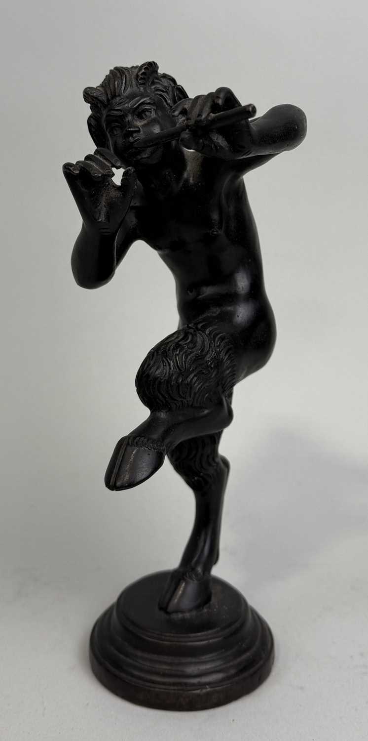 Lot 22 - A BRONZE SCULPTURE OF PAN PLAYING THE PIPES