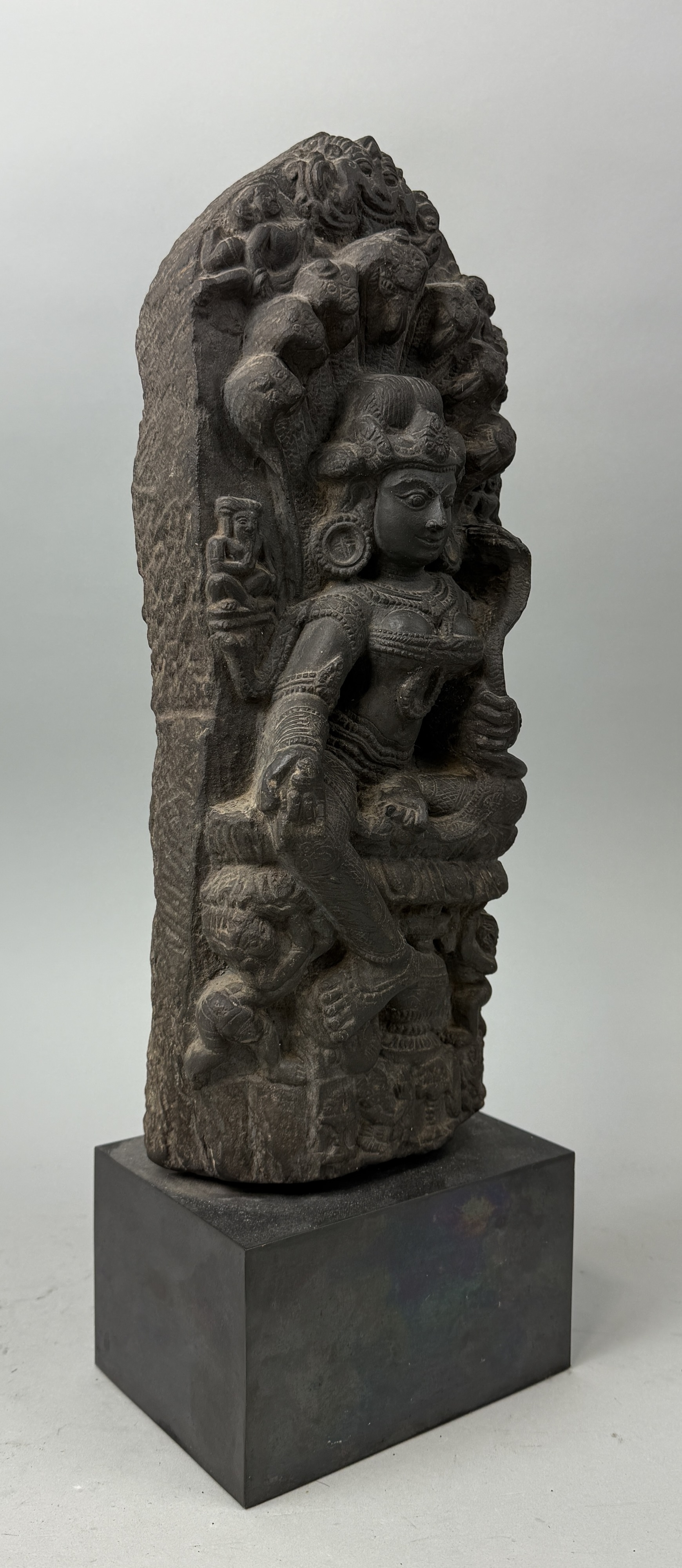 Lot 65 - A BLACK STONE STELE, PROBABLY EAST INDIA
