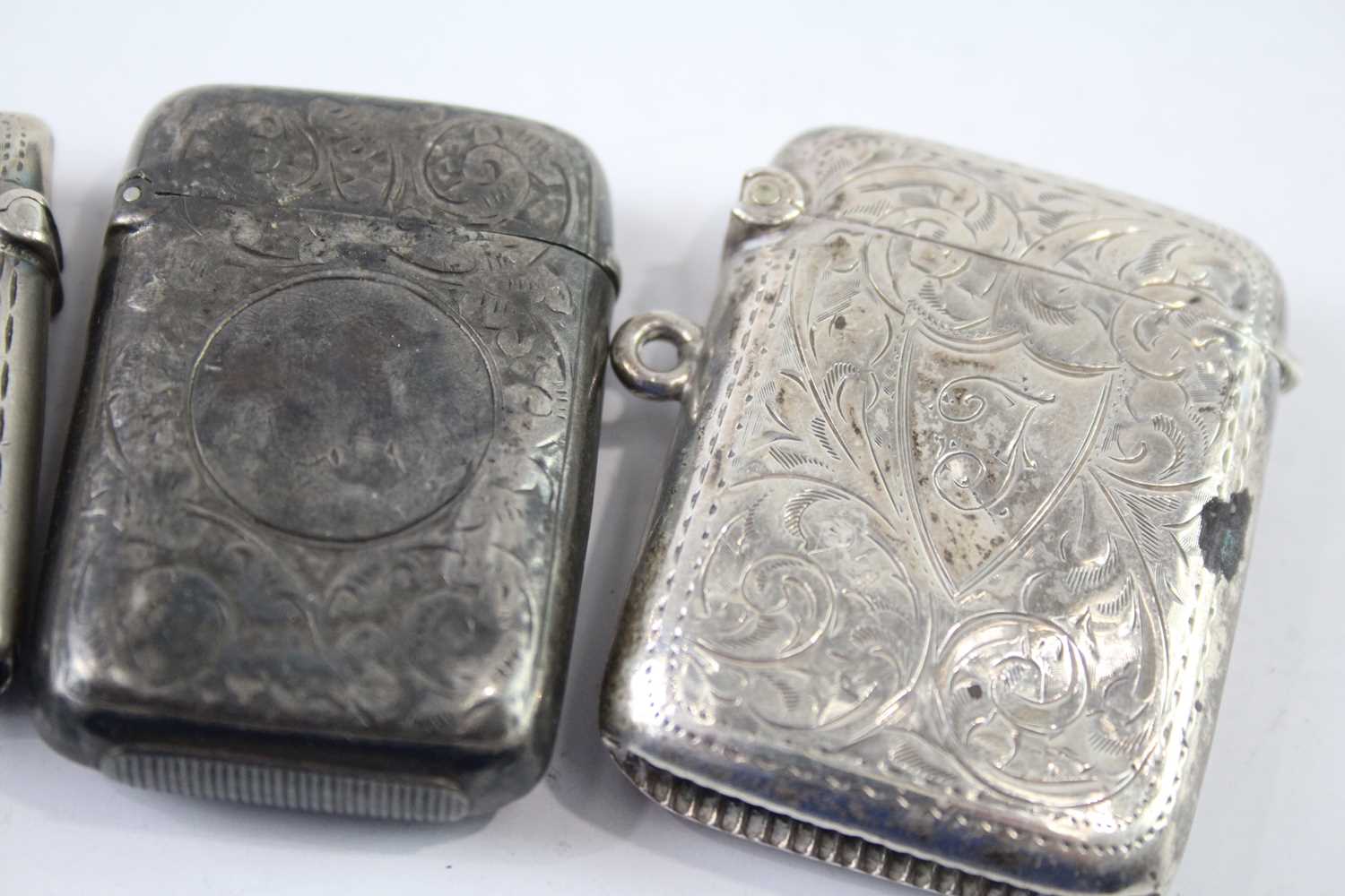 Lot 397 - FOUR .925 STERLING SILVER VESTA/MATCH CASES