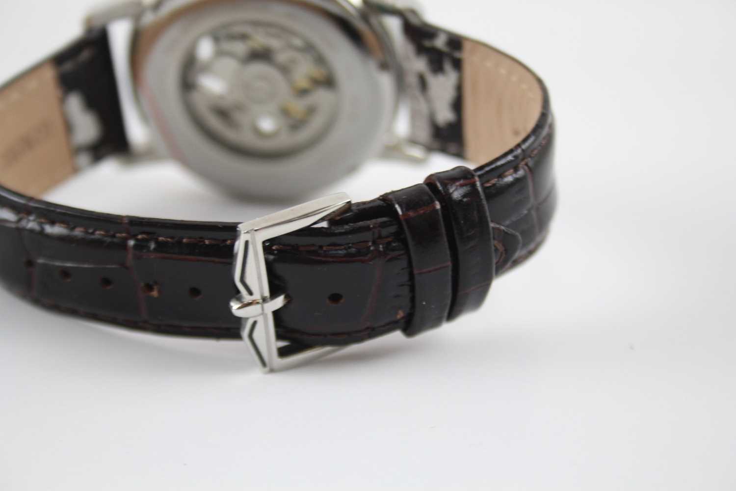 Lot 426 - A MEN'S ROTARY SKELETON DRESS WATCH