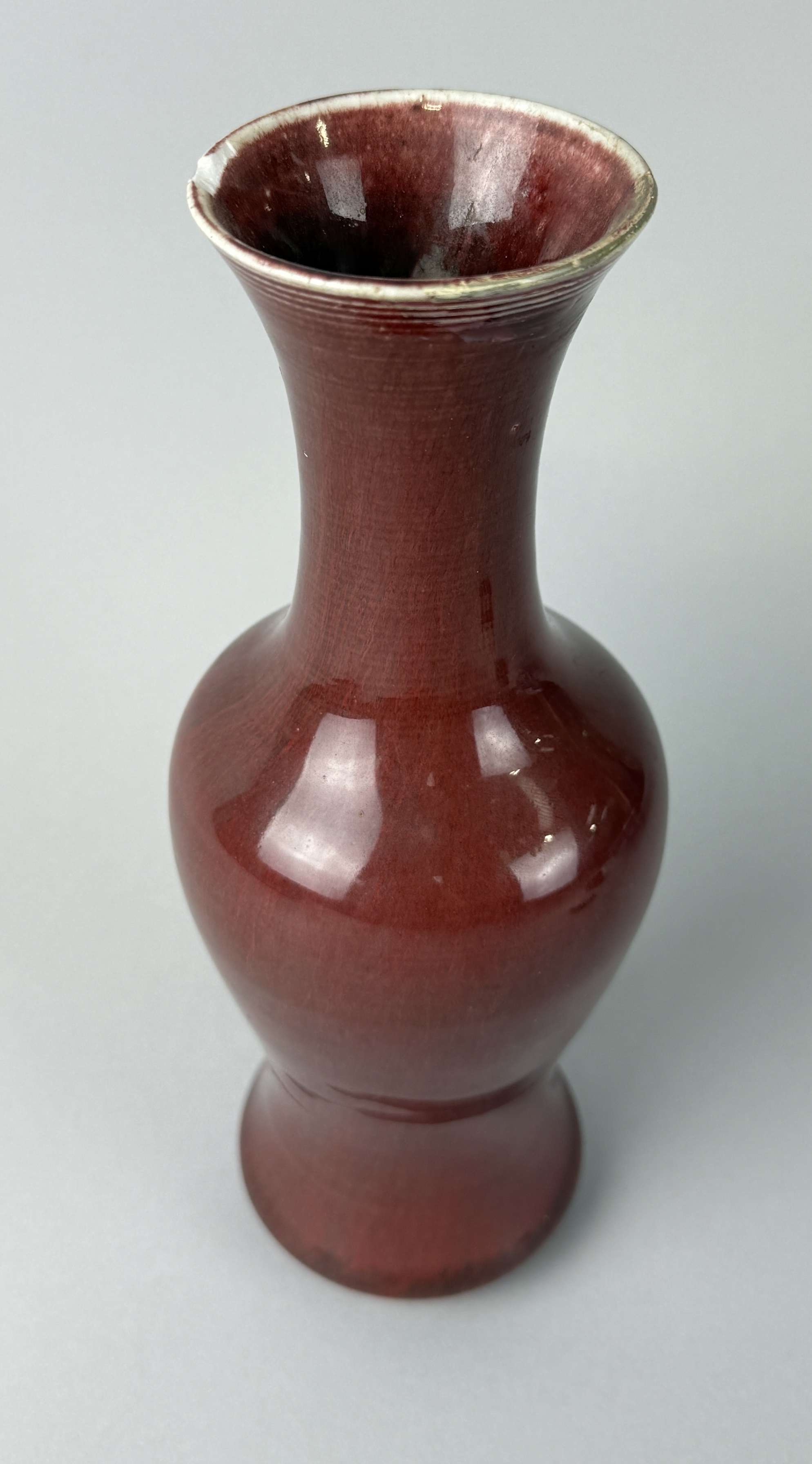 Lot 168 - A CHINESE 18TH CENTURY COPPER-RED VASE