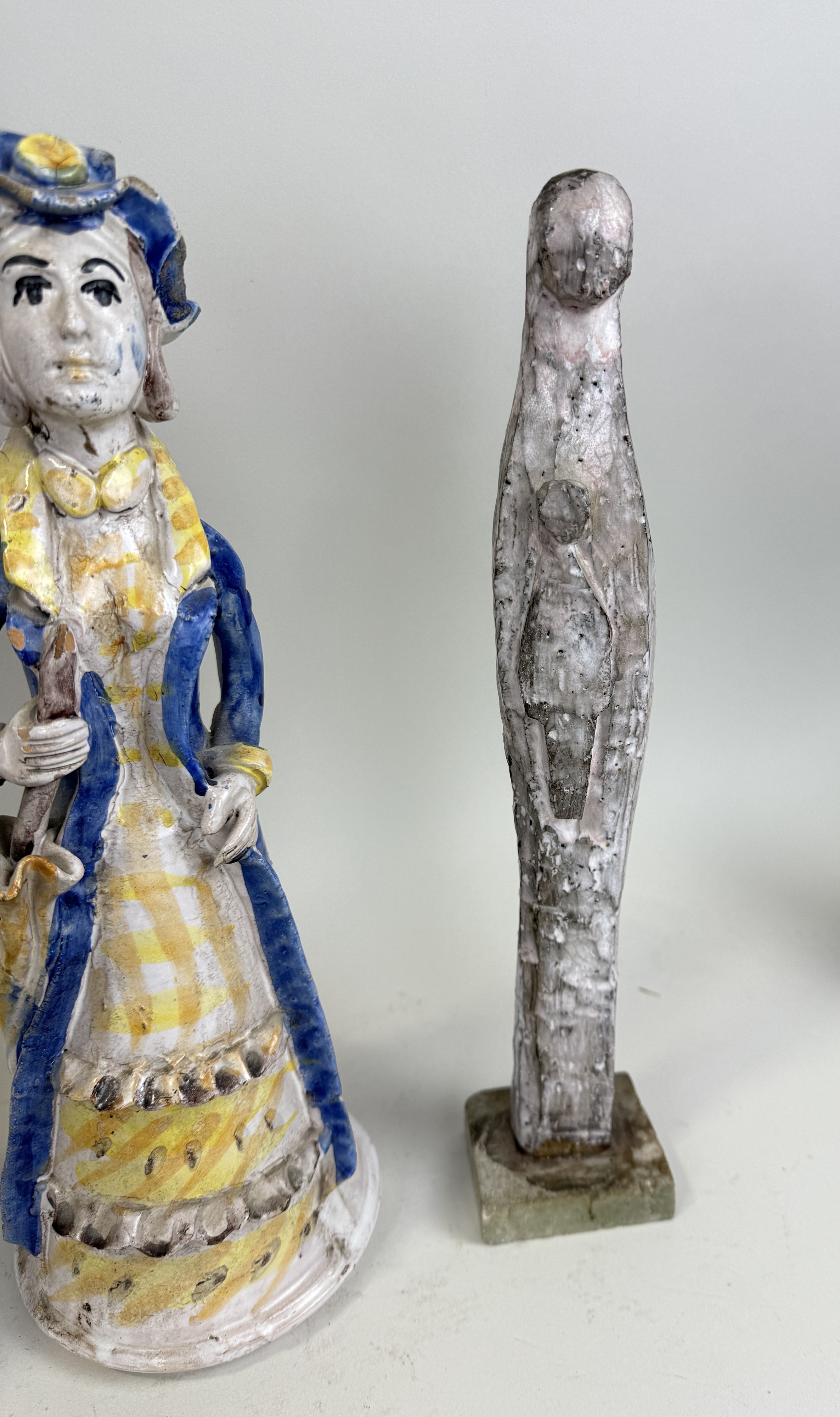 Lot 547 - THREE GLAZED CERAMIC FIGURES