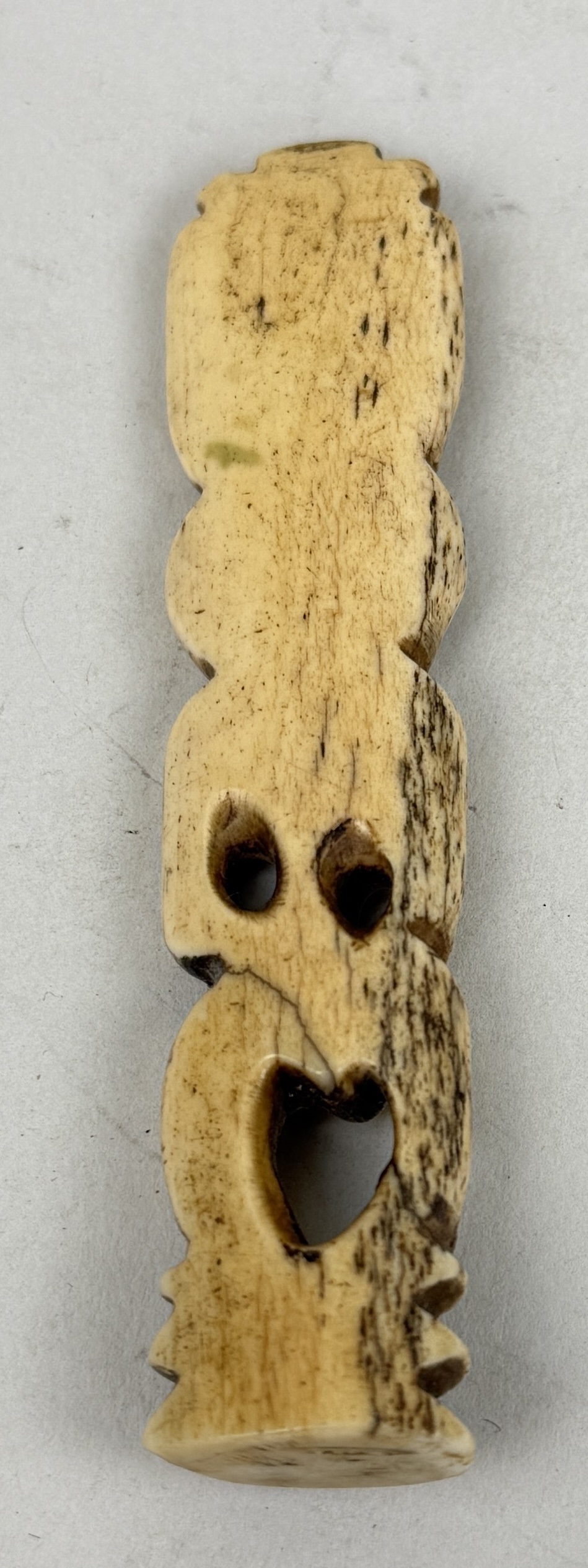 Lot 453 - AN OCEANIC BONE TOTEM FIGURE/AMULET