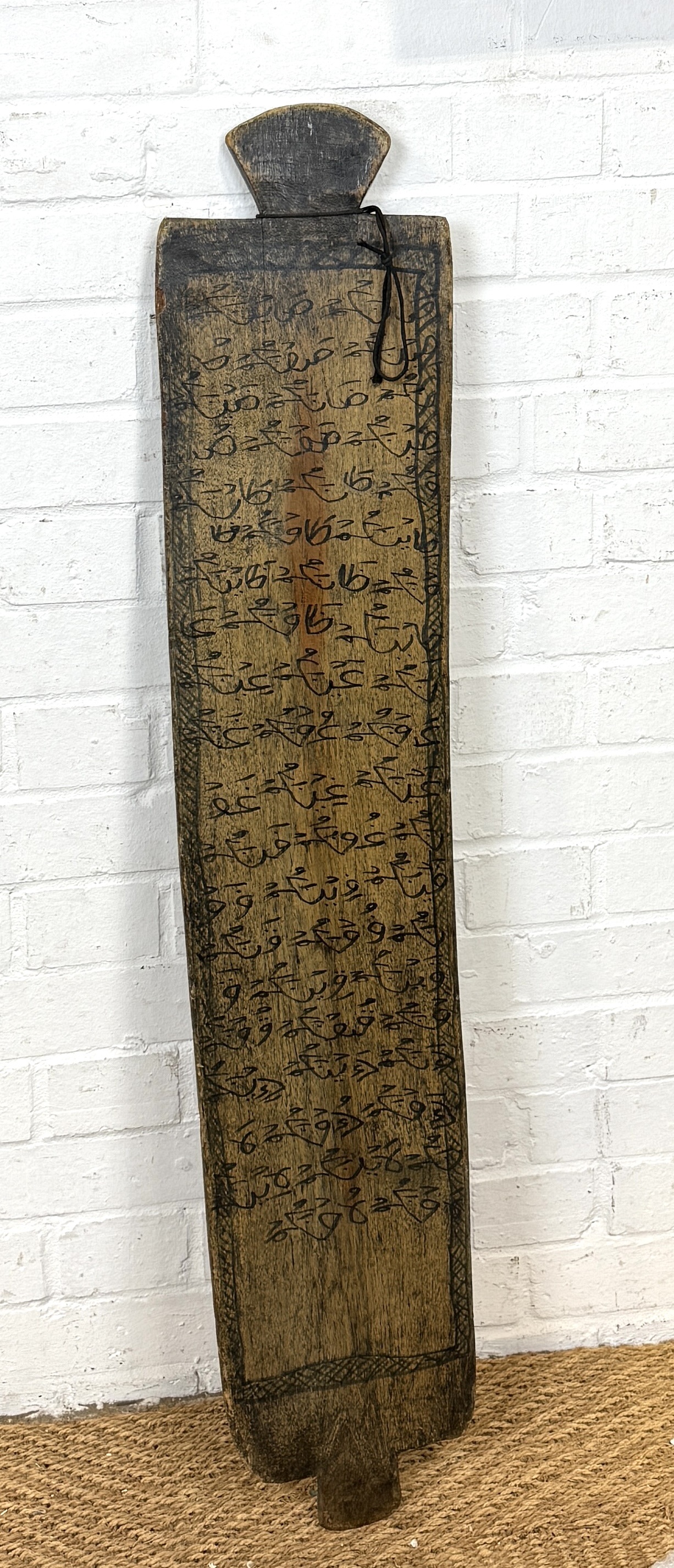 Lot 644 - AN ANTIQUE ETHIOPIAN QURAN TABLET WITH
