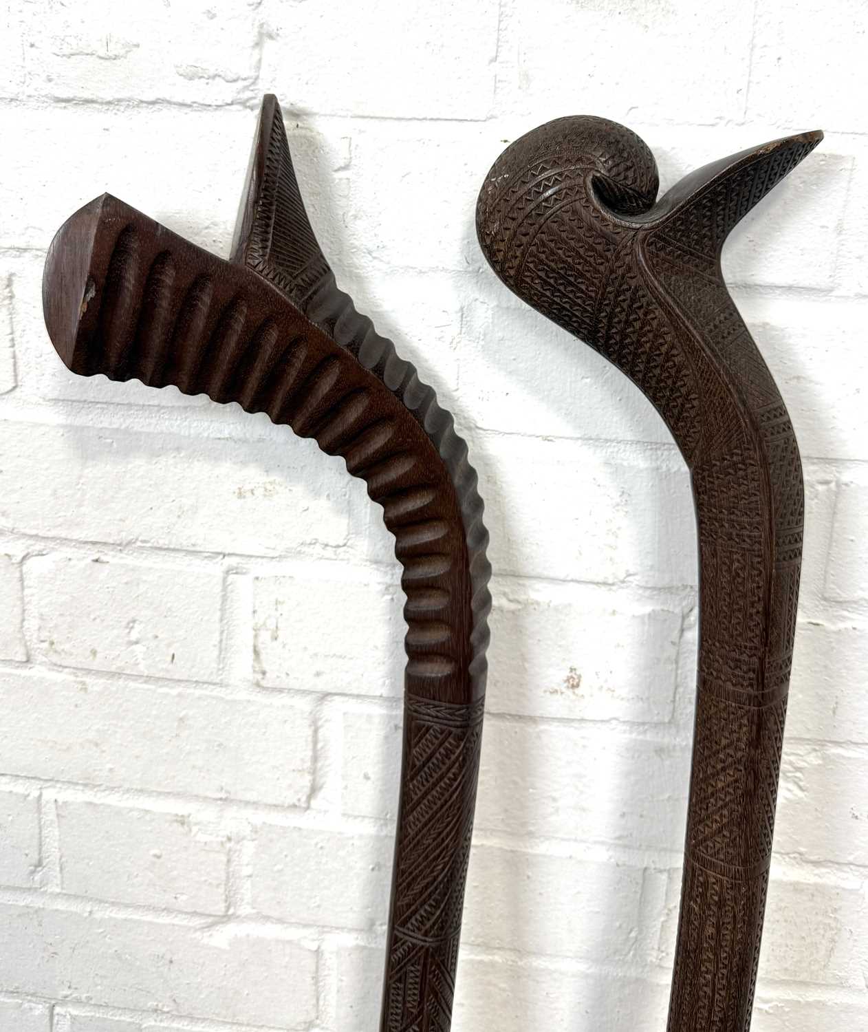 Lot 698 - TWO OCEANIC TRIBAL CLUBS WITH CARVED DETAIL