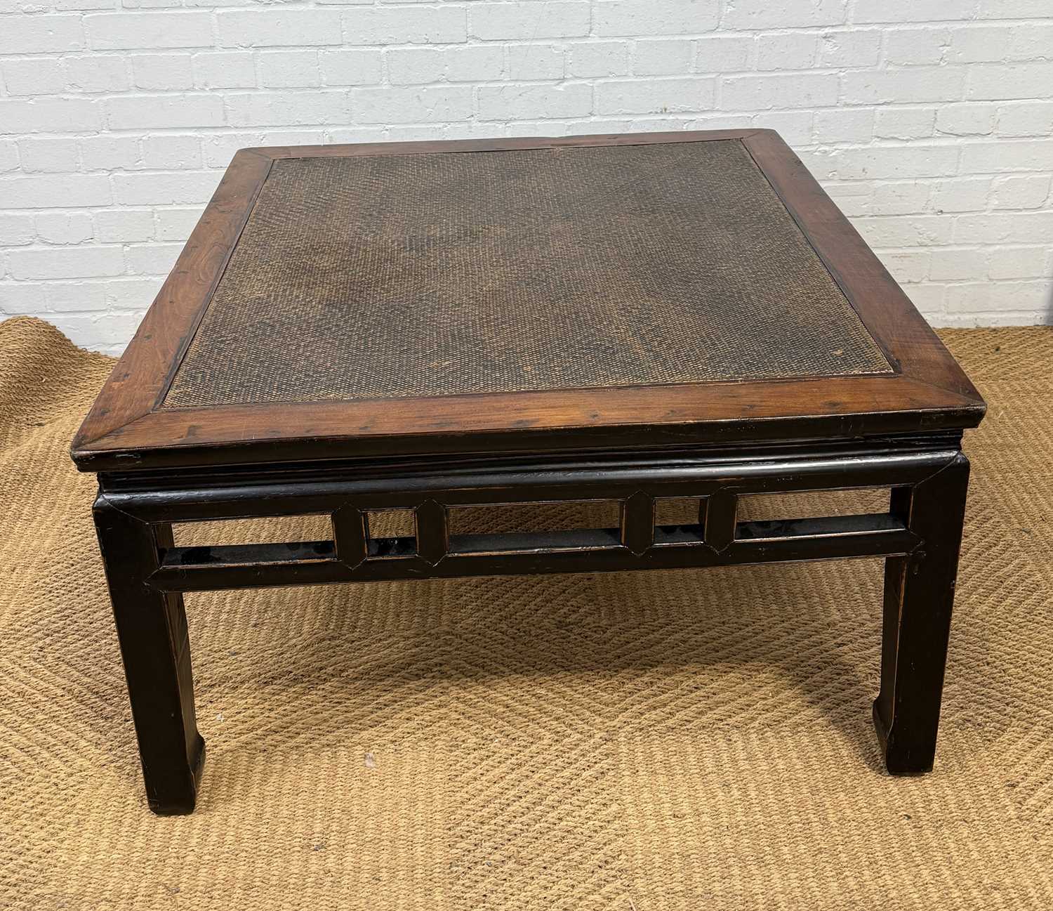 Lot 1390 - A CHINESE HARDWOOD OPIUM TABLE WITH RATTAN