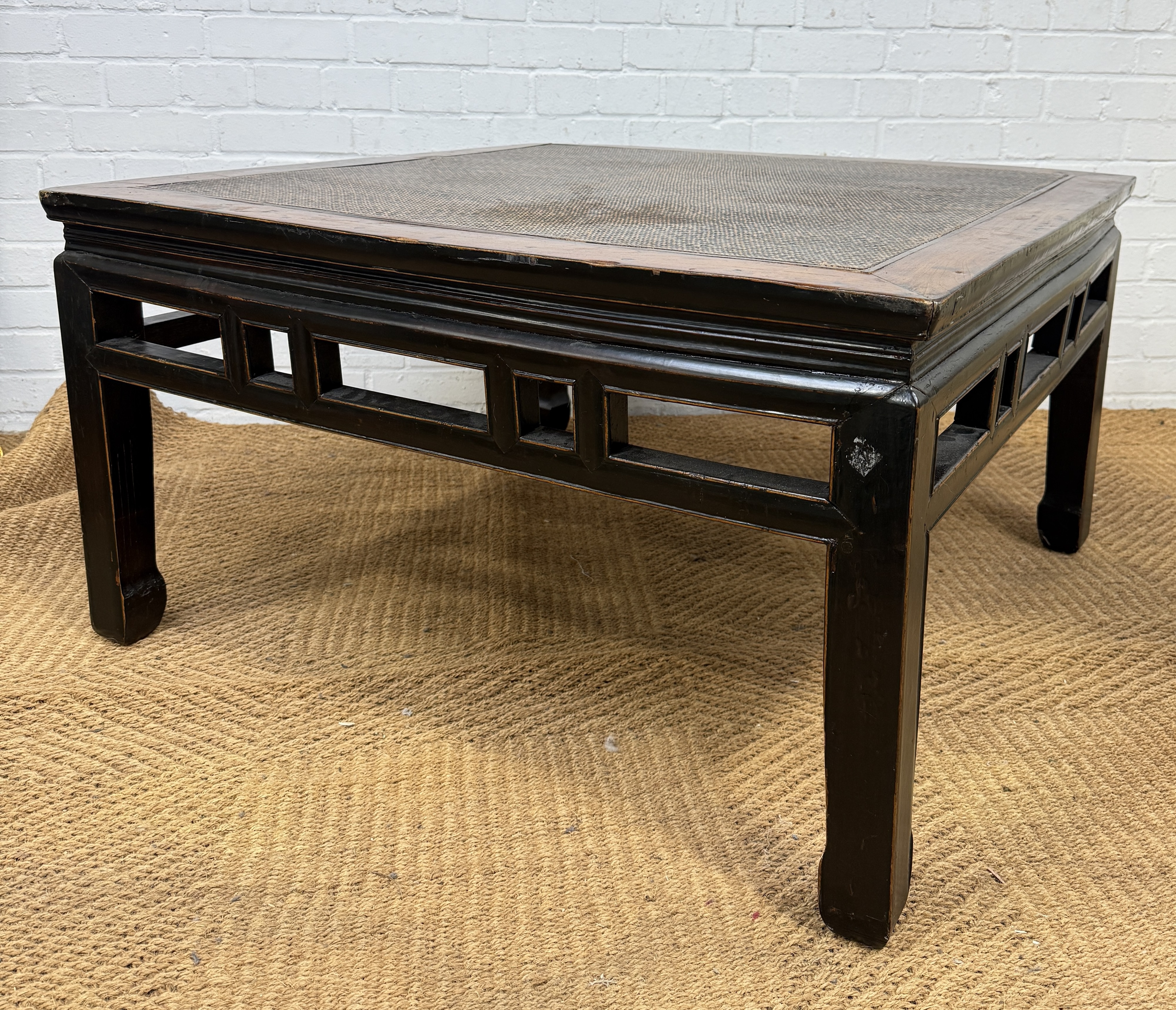 Lot 1390 - A CHINESE HARDWOOD OPIUM TABLE WITH RATTAN