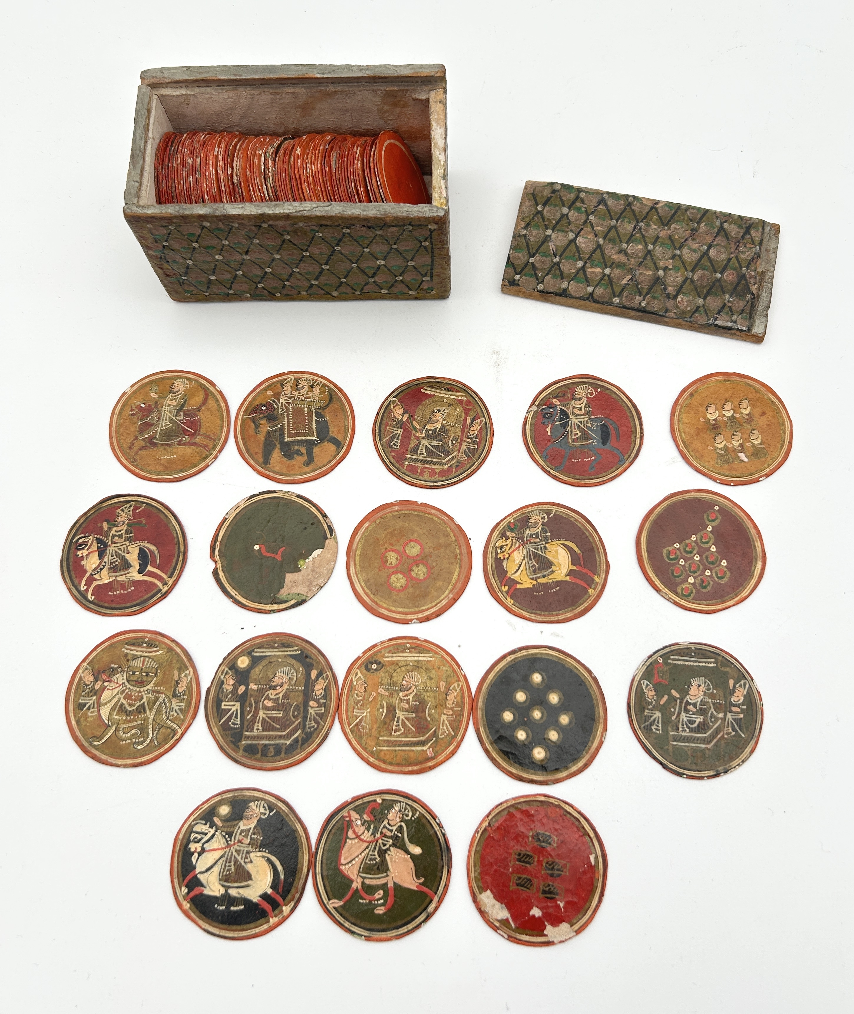 Lot 680 - A SET OF PERSIAN GANJIFA PLAYING CARDS IN