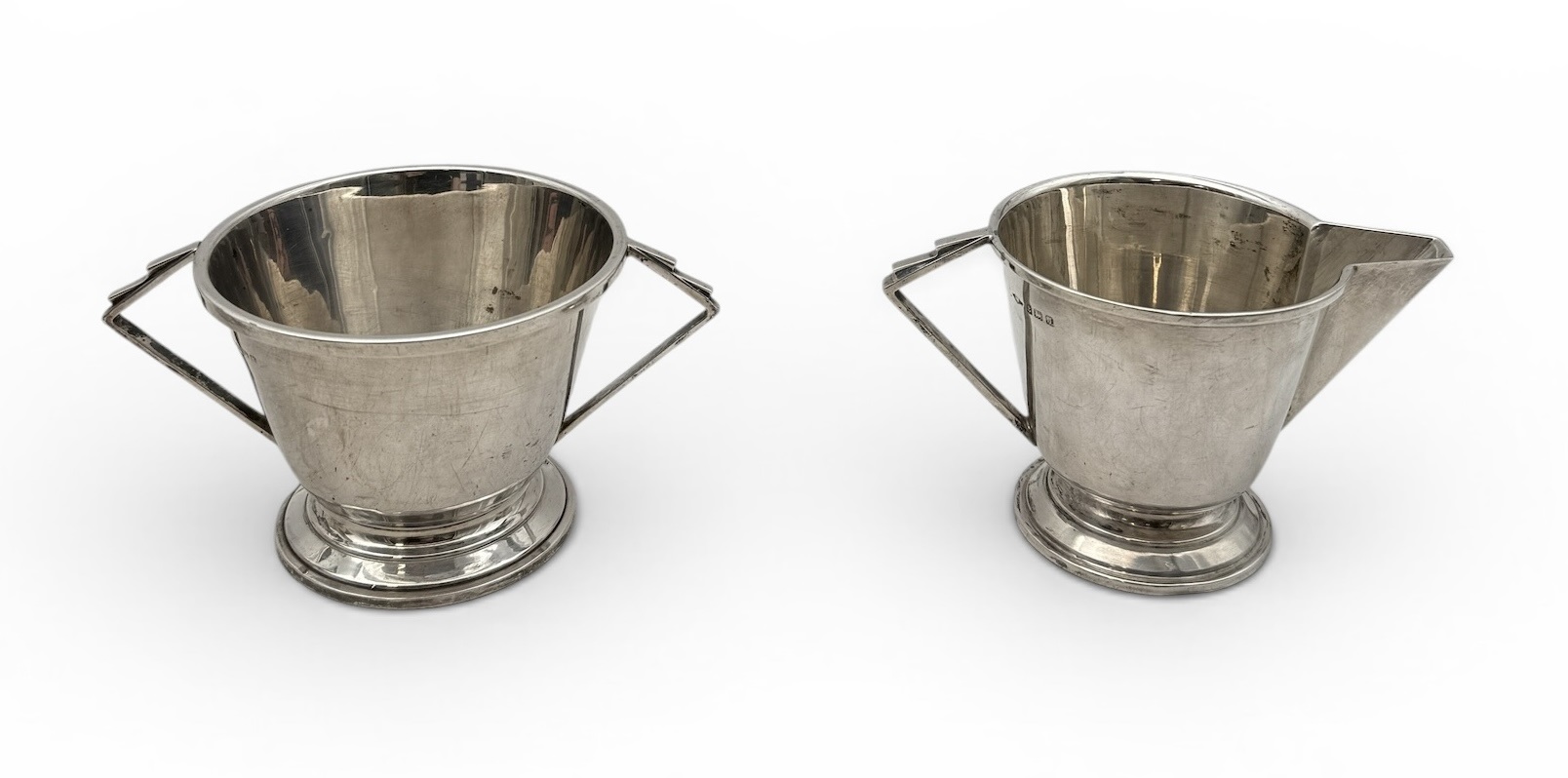 Lot 147 - AN ART DECO SILVER TEA SET COMPRISING TEA